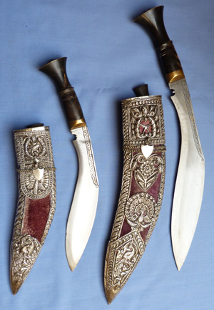 Pair of Matching Silver-Mounted Gurkha Kukris